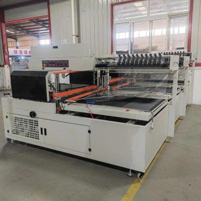China Automatic Heat Shrink Wrap Machine PLC Control 220V 380V 50Hz 60Hz POF PVC PE for sale