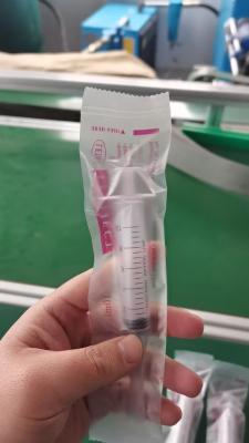 China Automatic PE Film Syringe Packaging Machine 380V 50Hz 10000 Pcs Per Hour for sale