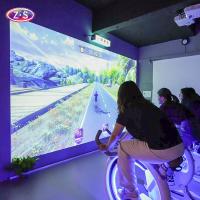 China Dynamic Cycling Simulator with 4000-Lumen Projection and 4-User Multiplayer Racing for Commercial Fitness for sale