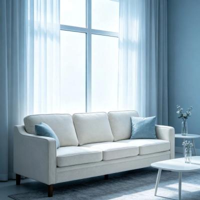 China Bright Cream Upholstered Three Seater Sofa for Modern Living Room Household Interior Styling for sale