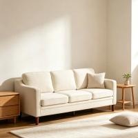 China Bright Cream Upholstered Three Seater Sofa for Modern Living Room Household Interior Styling for sale