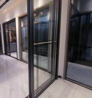 China Black Narrow Frame Double Glass Aluminium Sliding Doors For Meeting Room for sale