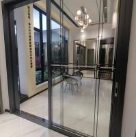 China Black Narrow Frame Double Glass Aluminium Sliding Doors For Meeting Room for sale