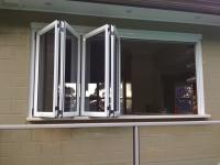 China Four Sashs Aluminum Folding Windows Vertical Reflective Glazed Anodizing for sale