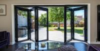 China Balcony Ultra Slim Aluminium Bifold Doors Insulating Glass With Light Rail for sale