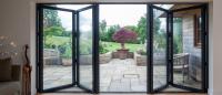 China ODM Triple Glazed Aluminium Bifold Doors Lightweight Durable With Security Mesh for sale
