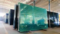 China 10mm Architectural Ultra Clear Flat Transparent Sheet Glass Low Iron Tempered Glass for sale