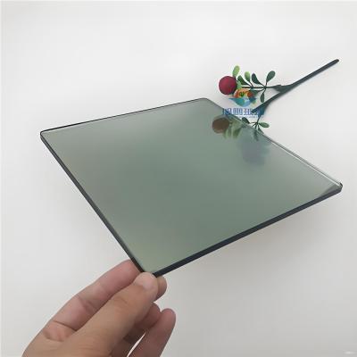 China Light Green Reflective Clear Float Glass with 3 Years Warranty and 91.5 Transmittance for Hotel and Office Window Decoration for sale