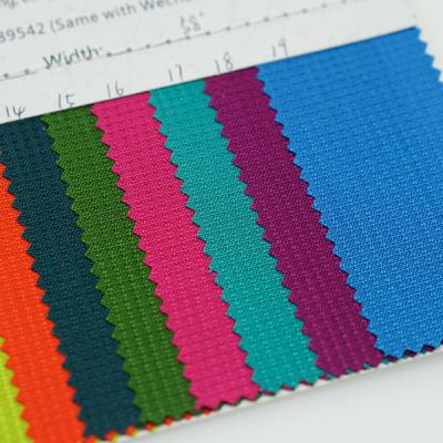 China Custom Plaid Surface 100% Polyester Fabric 238GSM Waterproof Cloth For Backpack for sale