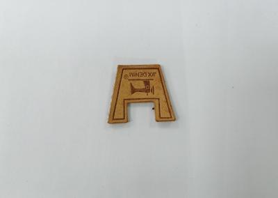 China Custom Embossed Logo Genuine Leather Sew On Patches for Garment Labels 100 PCS for sale