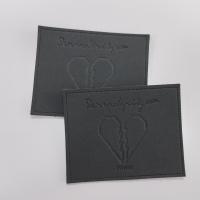 China Custom Embossed Leather Patches PU Leather Labels 100 PCS Minimum Order Eco Friendly for sale