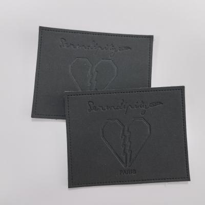 China Custom Embossed Leather Patches PU Leather Labels 100 PCS Minimum Order Eco Friendly for sale
