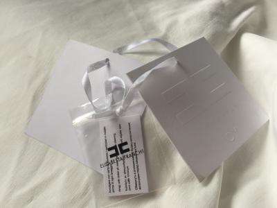 China Custom Debossed Logo White Card Clothing Hang Tags with String - 5mm Ribbon, 200pcs Pack, RoHS Certified for sale