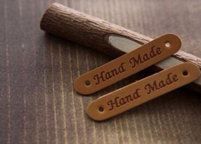 China Custom Embossed Leather Clothing Patches - Genuine & PU Leather - 200pcs MOQ - 7-10 Day Production for sale