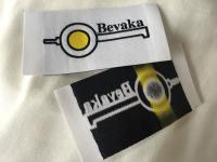 China Heat Cut Woven Iron-On Garment Labels with 3M Glue Backing - Custom Name Tags for Clothing Branding for sale