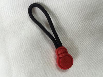 China Custom Logo Rubber Zipper Pullers for Bags and Clothes 3D Injection Molding for sale