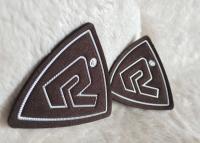 China Custom Brown Suede Embossed Leather Patches with Silver TPU Logo - 1.2mm Thickness, 500pcs MOQ, 7-10 Day Lead Time for sale