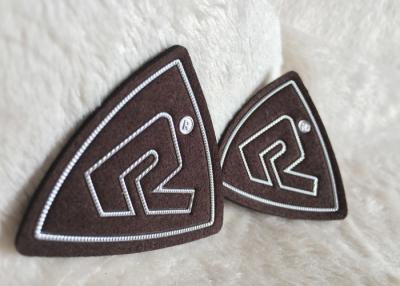 China Custom Brown Suede Embossed Leather Patches with Silver TPU Logo - 1.2mm Thickness, 500pcs MOQ, 7-10 Day Lead Time for sale