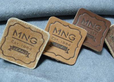 China Custom Embossed Leather Labels & Patches for Jeans and Bags - 200pcs MOQ, 350000 Weekly Capacity for sale
