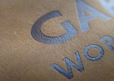 China Custom Embossed Genuine Leather Patches Tan Color for Jeans 100pcs MOQ for sale