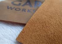 China Custom Embossed Genuine Leather Patches Tan Color for Jeans 100pcs MOQ for sale