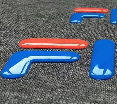 China Custom 3D Embossed Silicone Heat Transfer Patch for Clothing Iron On Logo Badge OEKOTEX for sale