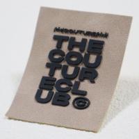 China Custom Foamed Silicone Print Label on Microfiber 3D Embossed Brand Tag for Luxury Apparel 4.5x2.5cm for sale