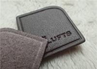 China Brown Veined Embossed Leather Patches High Frequency Brand Logo Sewing On Garment Custom 5-8 Days for sale