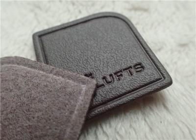 China Brown Veined Embossed Leather Patches High Frequency Brand Logo Sewing On Garment Custom 5-8 Days for sale