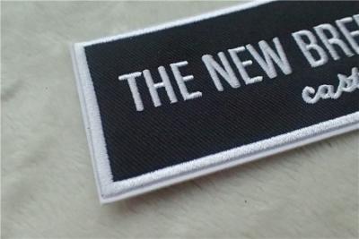 China Custom Washable Black Polyester Embroidered Patches 3D Adhesive Clothing Patches for sale