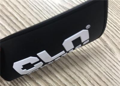 China Embossed White Character With Black Background Soft PVC Patches With Sewing Line for sale
