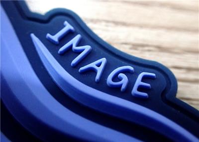 China Custom 3D Rubber Patches Dark Blue Embossed Logo Sew On Clothing Hats 2 Sizes for sale