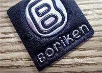 China Black Embossed Leather Patches with Silver TPU Logo - 5000pcs Daily Capacity, 500pcs MOQ for Bags and Garments for sale