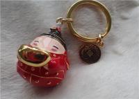 China Chinese Ceramic Fat Baby Gold Ingot Key Chain in Red Coating - 500pcs MOQ with Custom Logo Options for sale