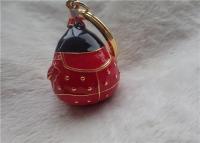 China Chinese Ceramic Fat Baby Gold Ingot Key Chain in Red Coating - 500pcs MOQ with Custom Logo Options for sale