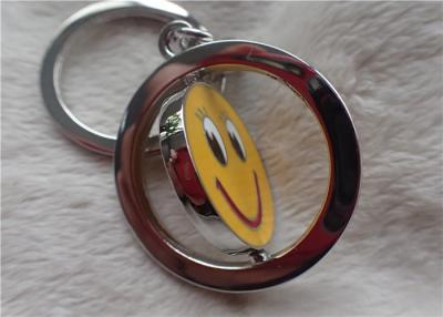 China Custom Silver Metal Keychain with Rotatable Smiling Yellow Face Promotional Gift 2.5cm for sale
