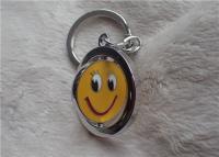 China Custom Metal Keychain Rotatable Smiling Yellow Face Promotional Gift Silver 2.5cm for sale