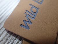 China Washable Brown Soft Leather Embossed Hang Tags Eco Friendly 500 Pcs MOQ Custom Logo for sale
