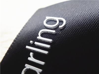 China Custom Smooth Ribbon Silicone Screen Printing Label 3D Logo Thick Plate White Black for sale