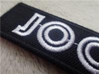China Custom Embroidered Patches Black Twill White Line Heat Seal Backing 500pcs MOQ for sale