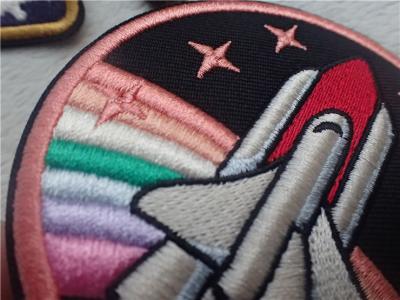 China Custom Embroidered Patches with Hot Melt Backing 7cm Silk Thread Fashion Design for sale