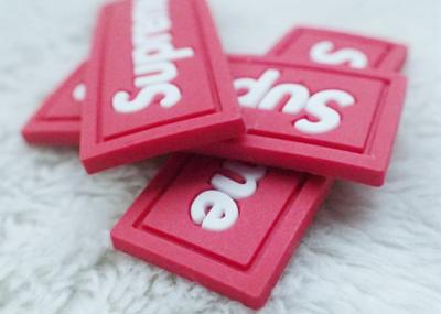 China Flat Color Separation PVC Rubber Logo Patches - 500PCS MOQ, 9-12 Day Production, OEKO-TEX Certified for sale