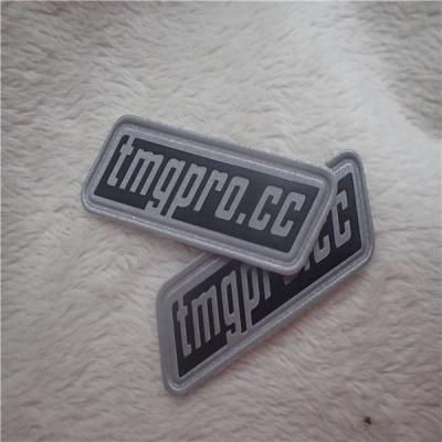 China Outdoor Reflective PU Leather Patches 50×12mm × 1mm Thick with High Frequency Sewing for Safety Workwear for sale