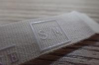 China Custom Woven Labels with 3D Ink or Silicon Logo - 50,000pcs Daily Capacity, SGS Certified for sale
