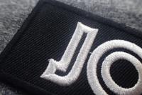 China Heat Cut Polyester Embroidered Badge - Custom Patches for Clothing & Caps with 500pcs MOQ for sale
