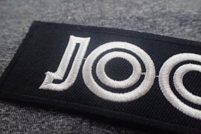 China Heat Cut Polyester Embroidered Badge - Custom Patches for Clothing & Caps with 500pcs MOQ for sale