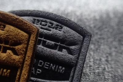China Custom Microfiber Woven Clothing Labels 3D Snow Suit Embossed Patches SGS Certified for sale