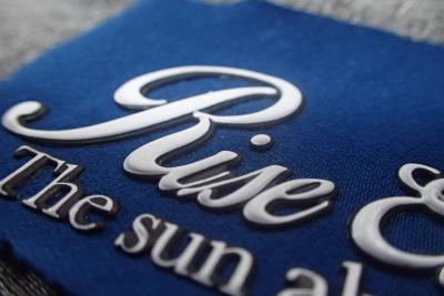 China Embossed 0.7mm Transparent TPU Patches for Polo Shirts Custom Logo Heat Transfer Labels for sale
