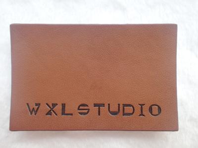 China Custom Embossed Leather Patch Label for Garments Real or PU Leather 100 PCS MOQ for sale