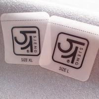 China Transparent Soft TPU Clothing Labels with 3D Embossed Effects - Custom Sizes & CMYK Colors for Swimwear & Apparel for sale